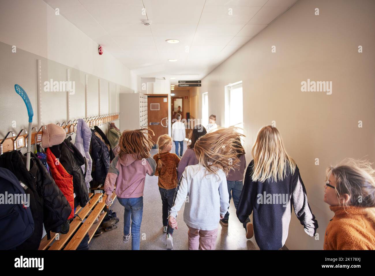 Girls at school corridor Stock Photo - Alamy
