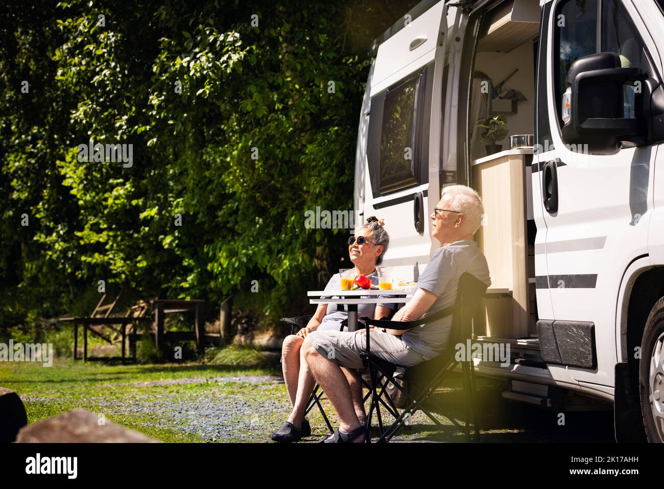 Couple in front camper trailer hi-res stock photography and images - Alamy