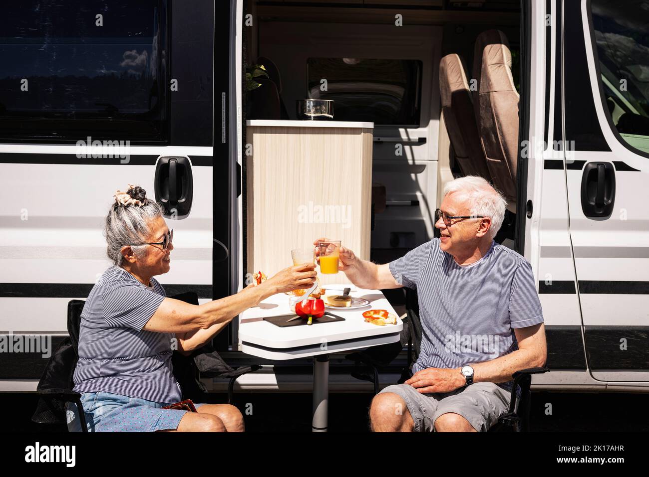 Couple in front camper trailer hi-res stock photography and images - Alamy
