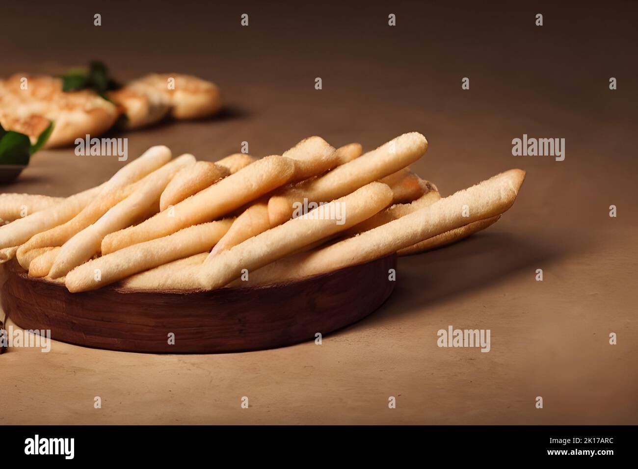 a bunch of breadsticks placed aesthetically in a wooden plate Stock ...
