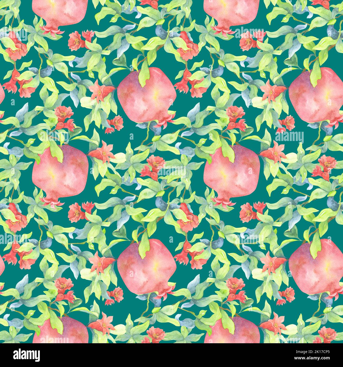 Large pomegranates on branches with green leaves and red flowers ...