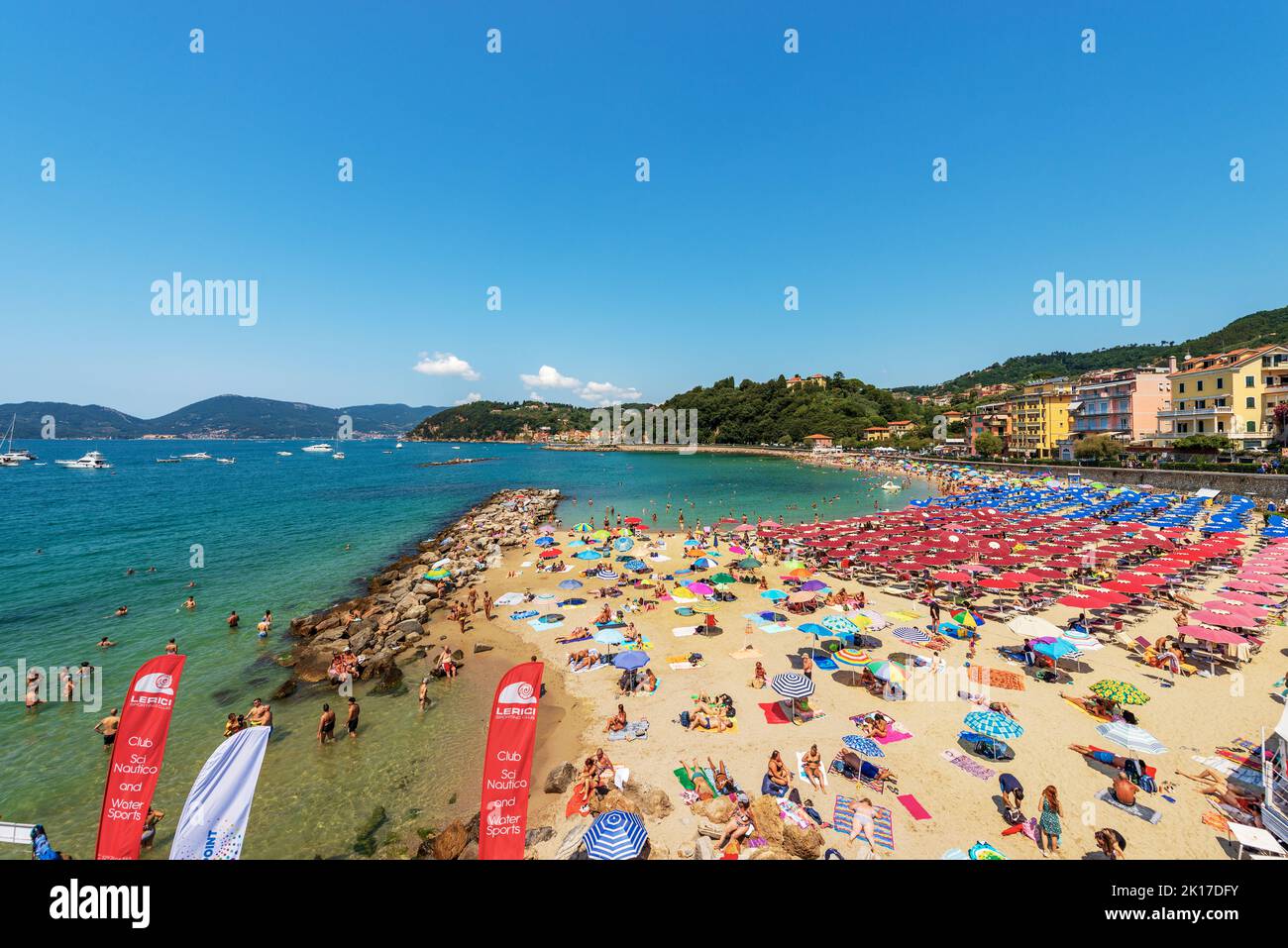 Beach of Lerici Town with many umbrellas, tourist resort on the coast ...