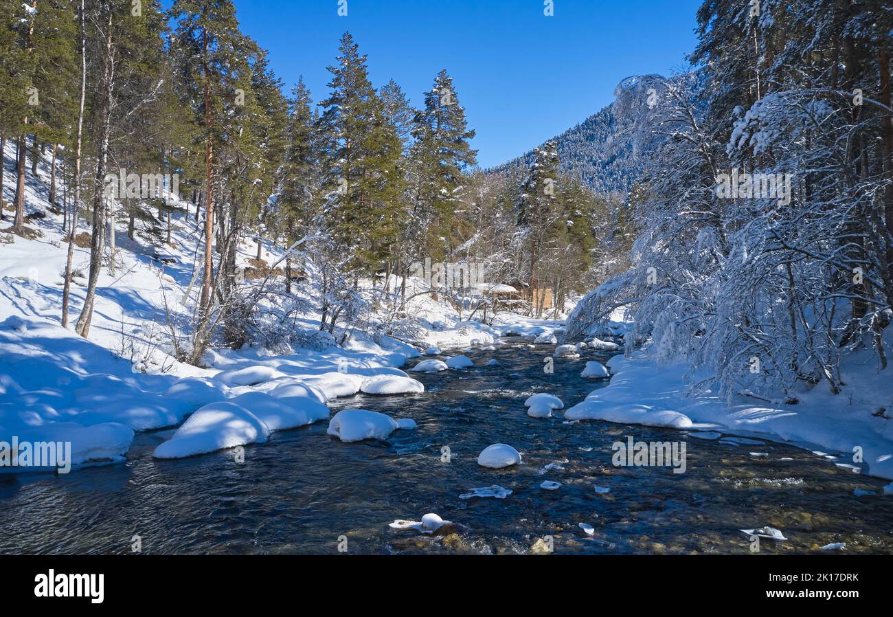 Winter landscape of cold mountain river in february Stock Photo - Alamy