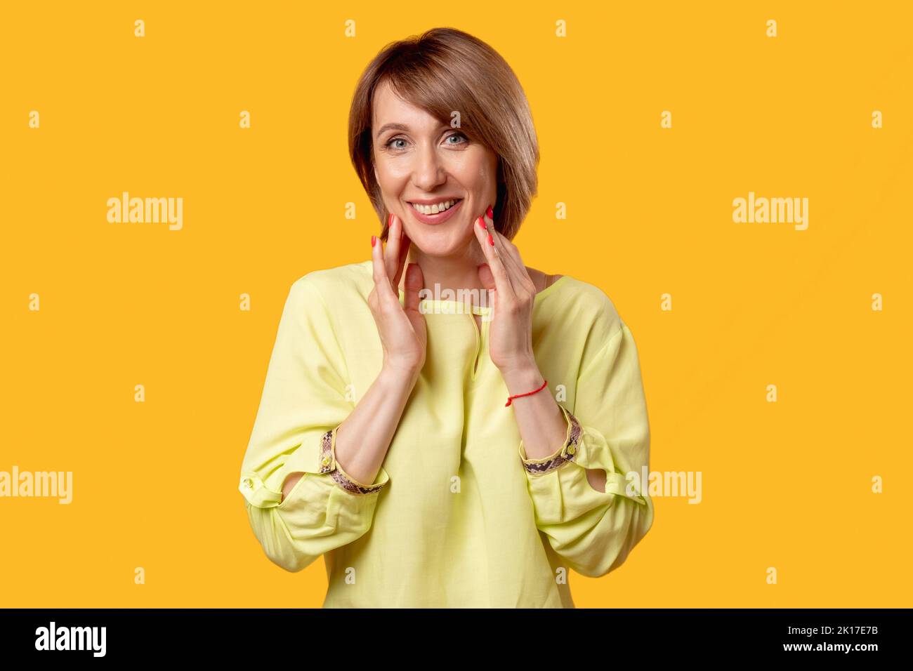 Satisfied mature woman. Face skin care. Anti-aging procedure. Aesthetic ...