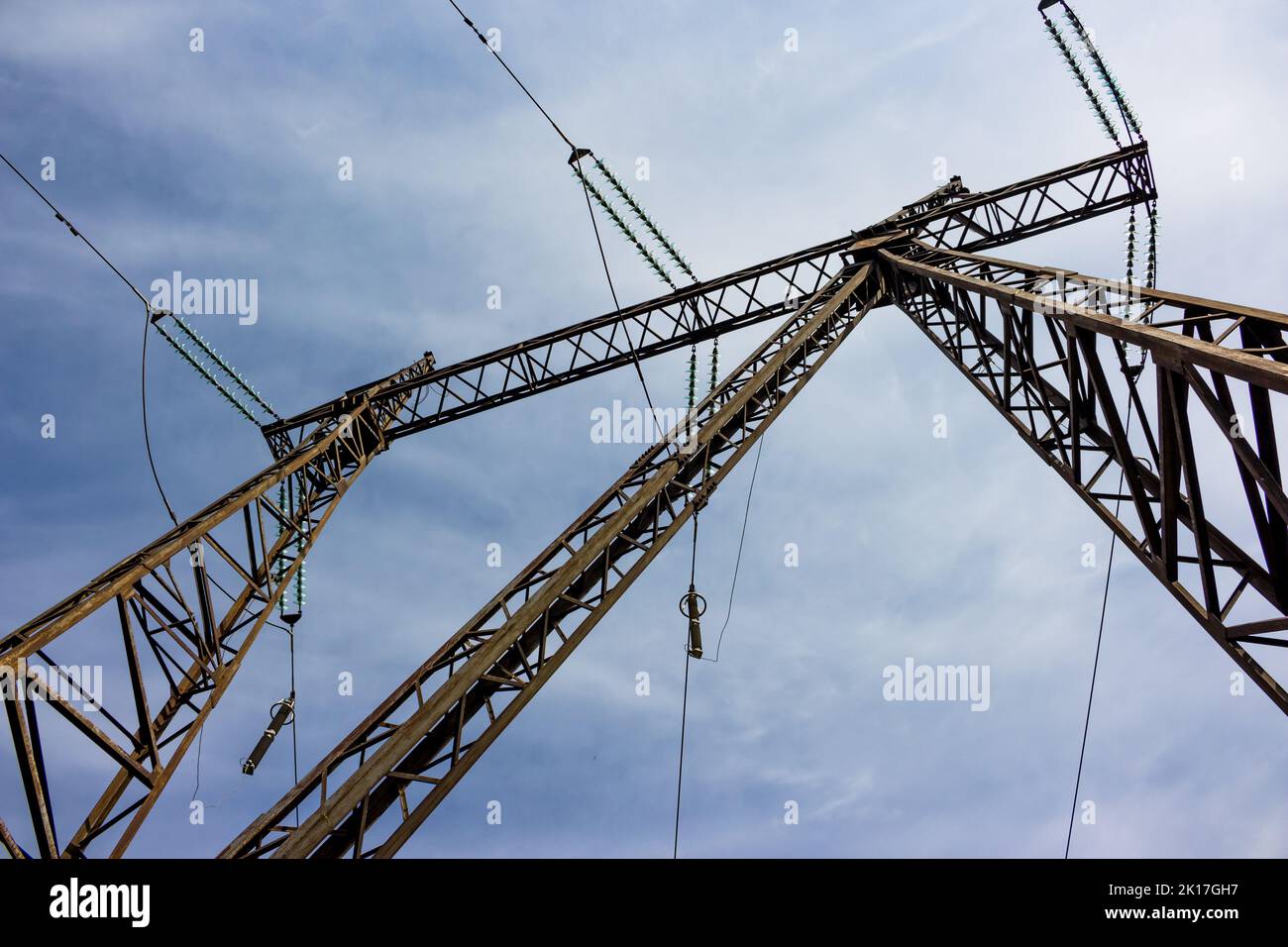 Bottom-up view of a 220 kV overhead power line tower structure Stock ...