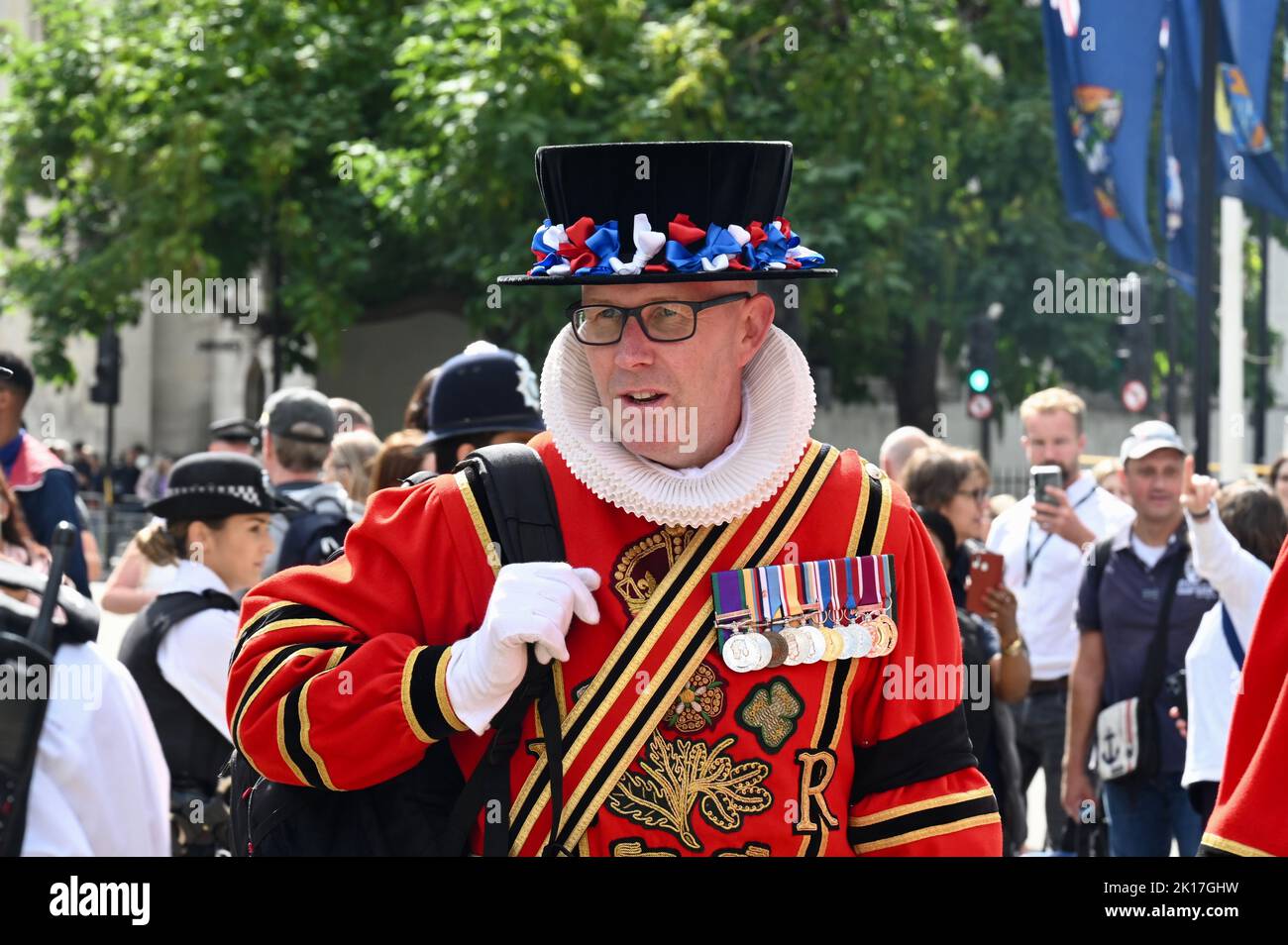 Beefeater. Mourners left Westminster Hall having paid their respects to ...