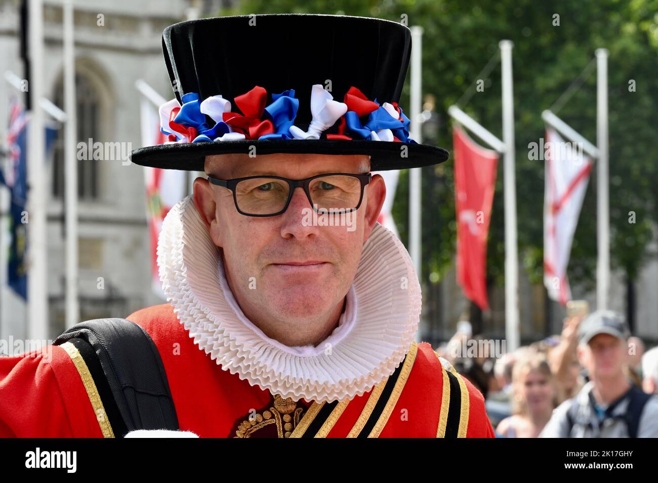 Beefeater. Mourners left Westminster Hall having paid their respects to ...