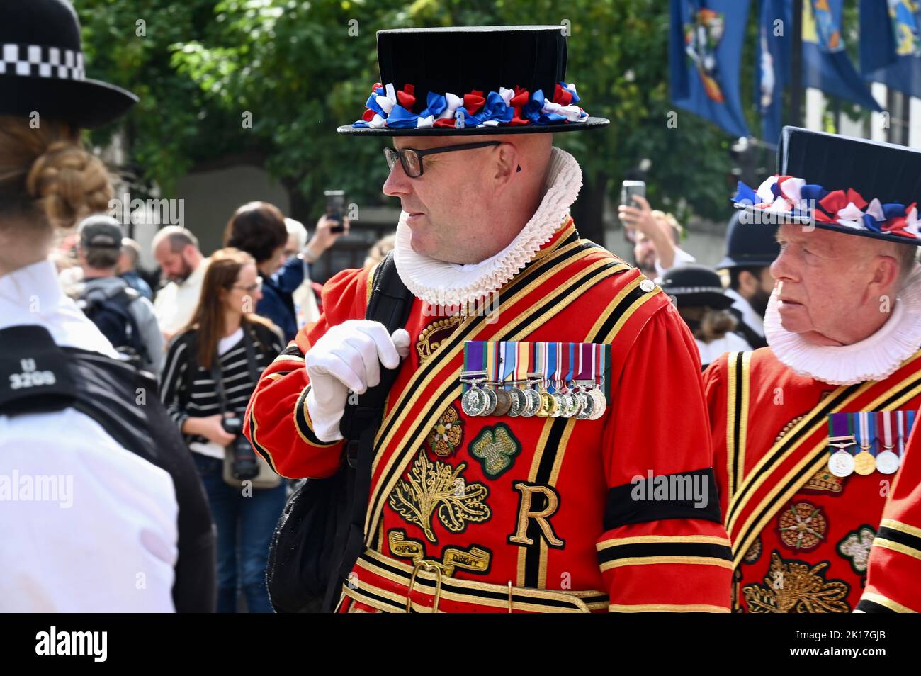 Beefeater. Mourners left Westminster Hall having paid their respects to ...
