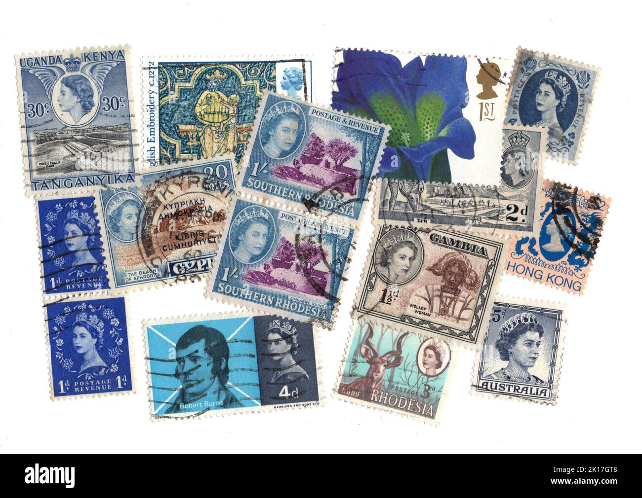 A montage of blue vintage Queen Elizabeth II stamps from around the ...