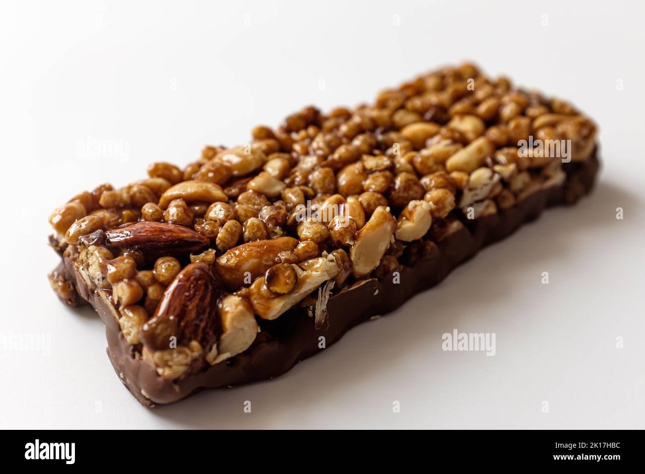 Nuts bar on a white background Stock Photo - Alamy