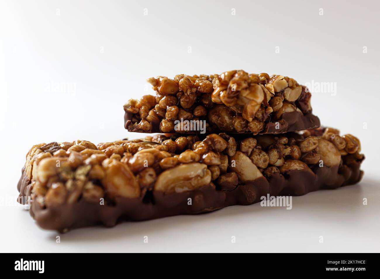 Nuts bar on a white background Stock Photo - Alamy