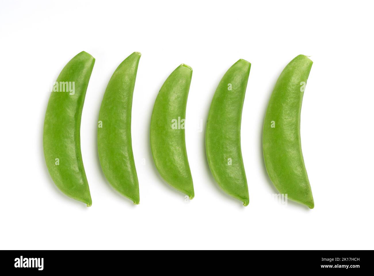 Sugar snap peas in a row on white, product of kenya cut out Stock Photo ...