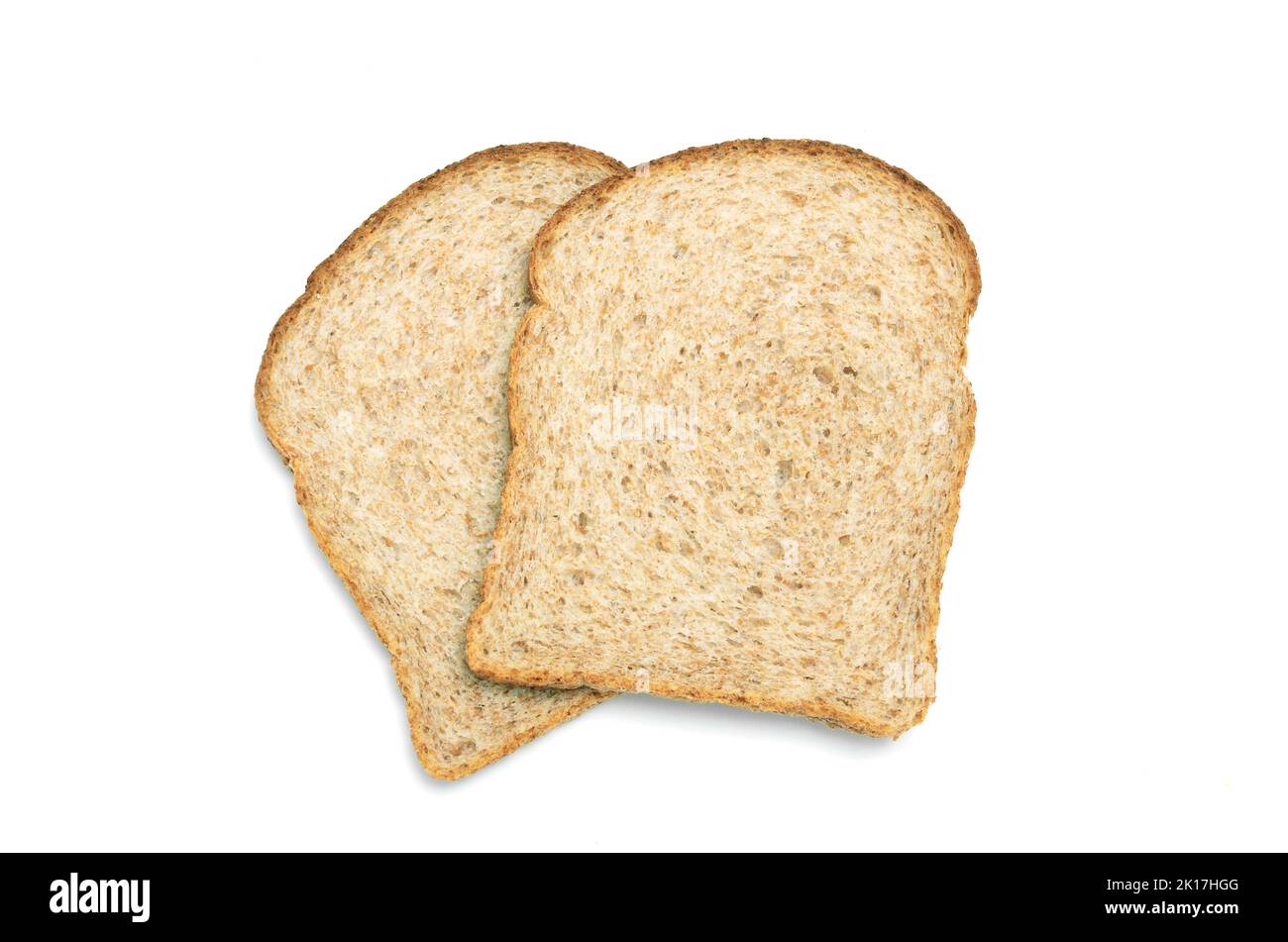 Two slices of wholemeal brown bread shot from above on white background ...