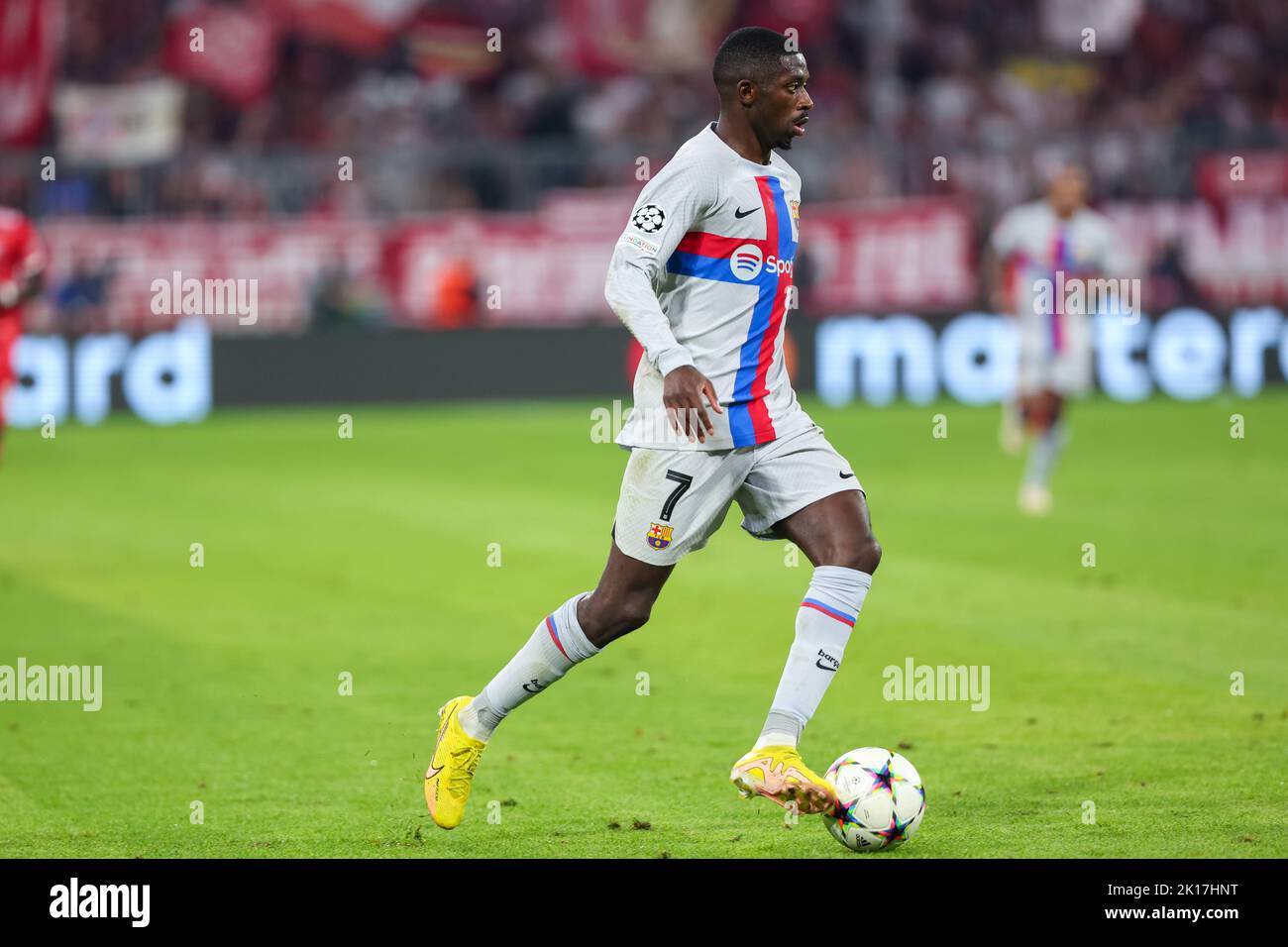 MUNCHEN, GERMANY - SEPTEMBER 13: Ousmane Dembele of FC Barcelona runs ...
