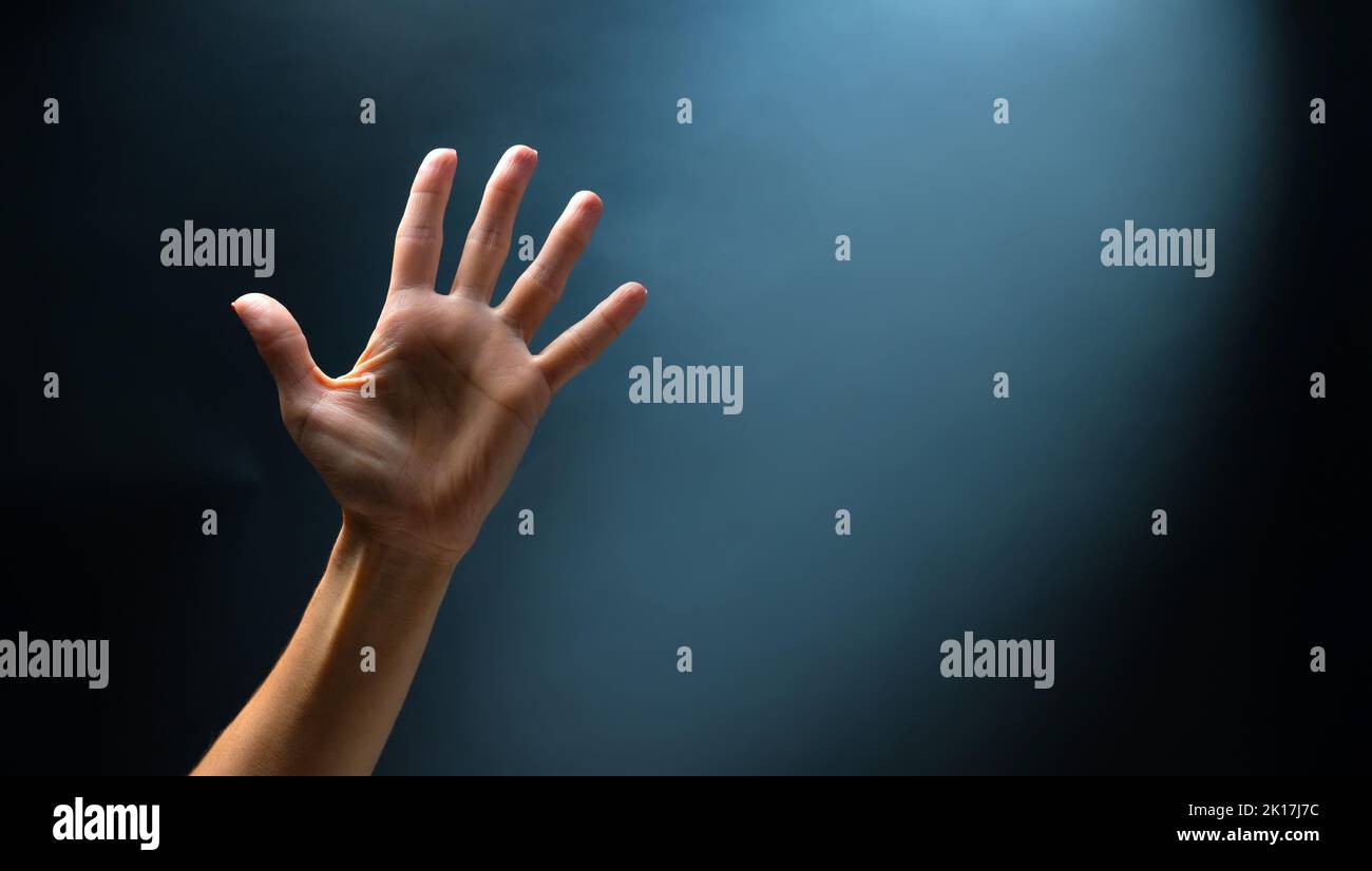 Hand shows signs with fingers Stock Photo - Alamy