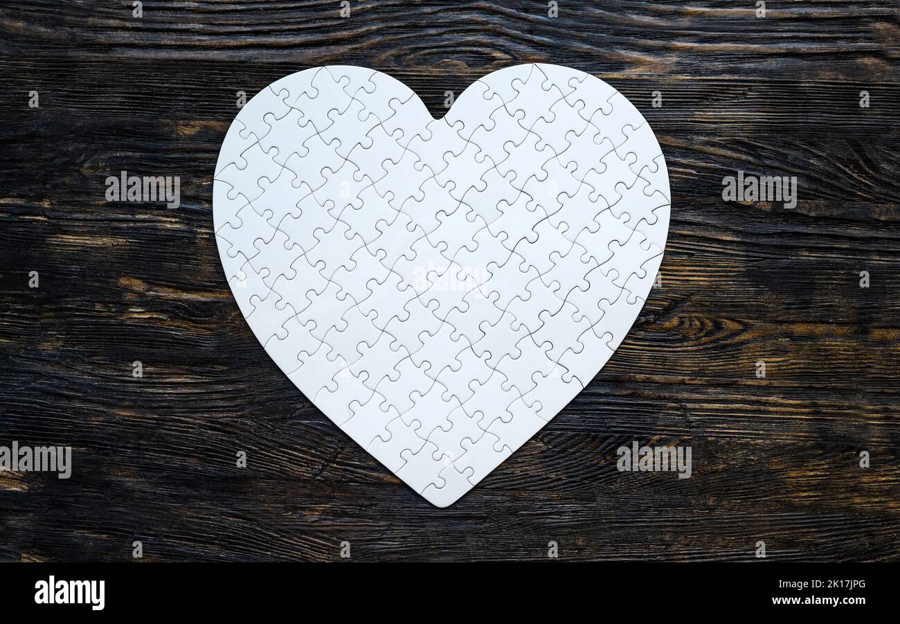 Heart shape puzzle Stock Photo - Alamy