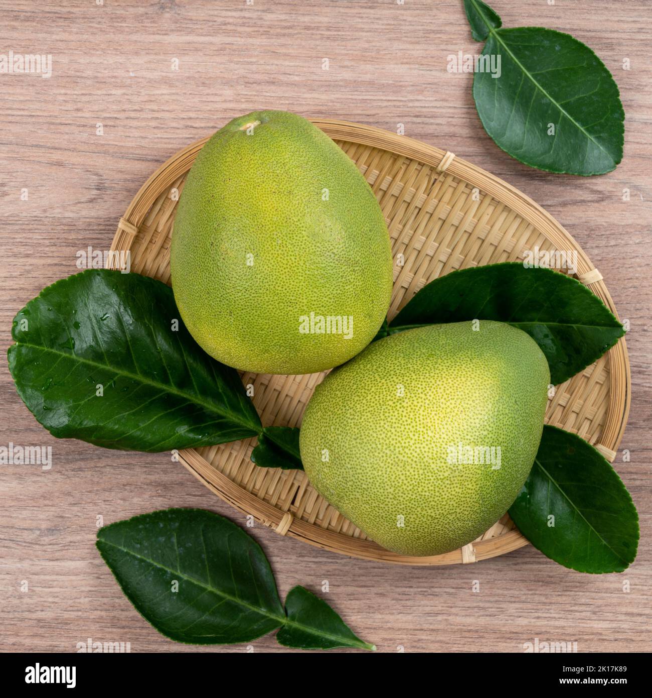 Top view of fresh peeled pomelo on bright wooden table background for ...