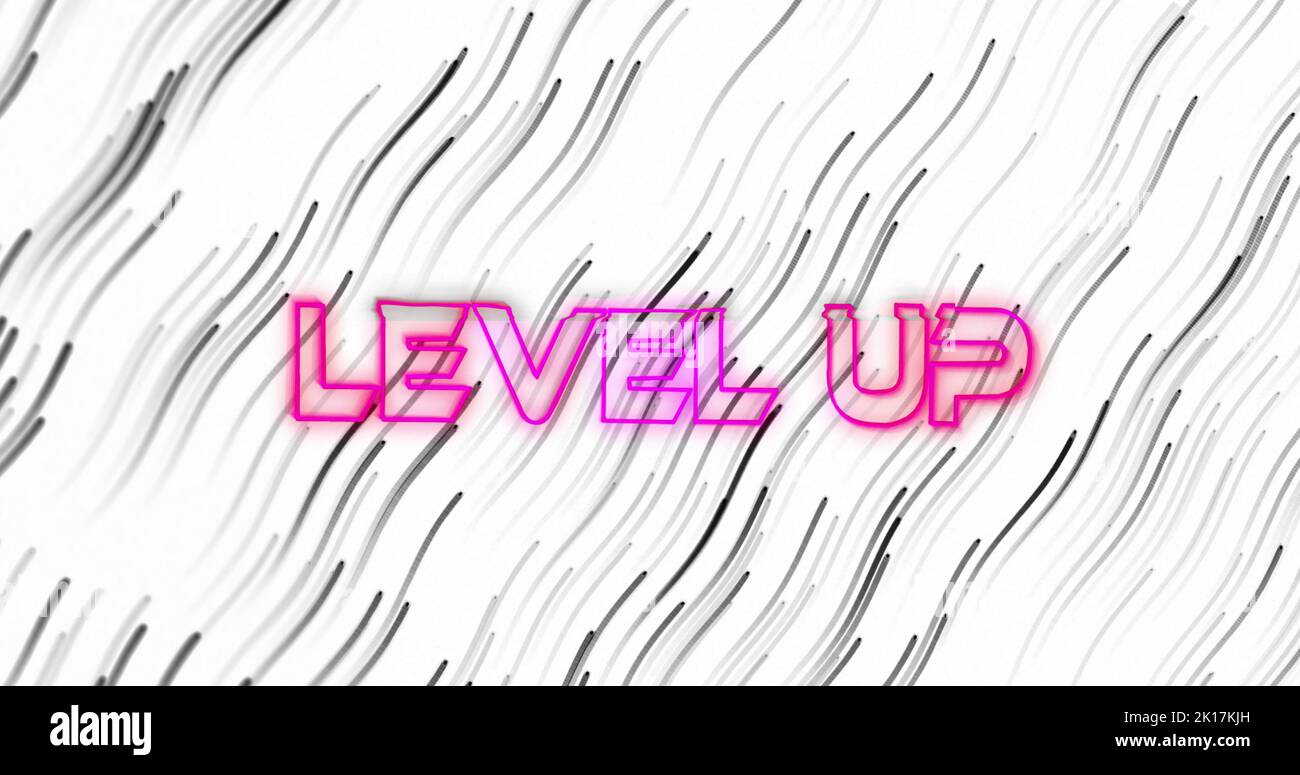 Image of level up text over moving trails Stock Photo - Alamy