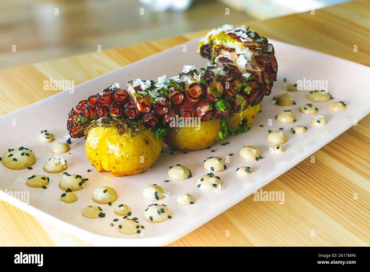 Grilled Galician octopus leg with roasted potatoes and garlic aioli ...