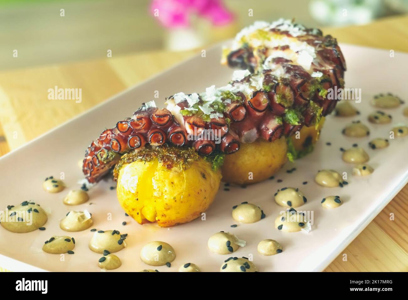 Grilled Galician octopus leg with roasted potatoes and garlic aioli ...
