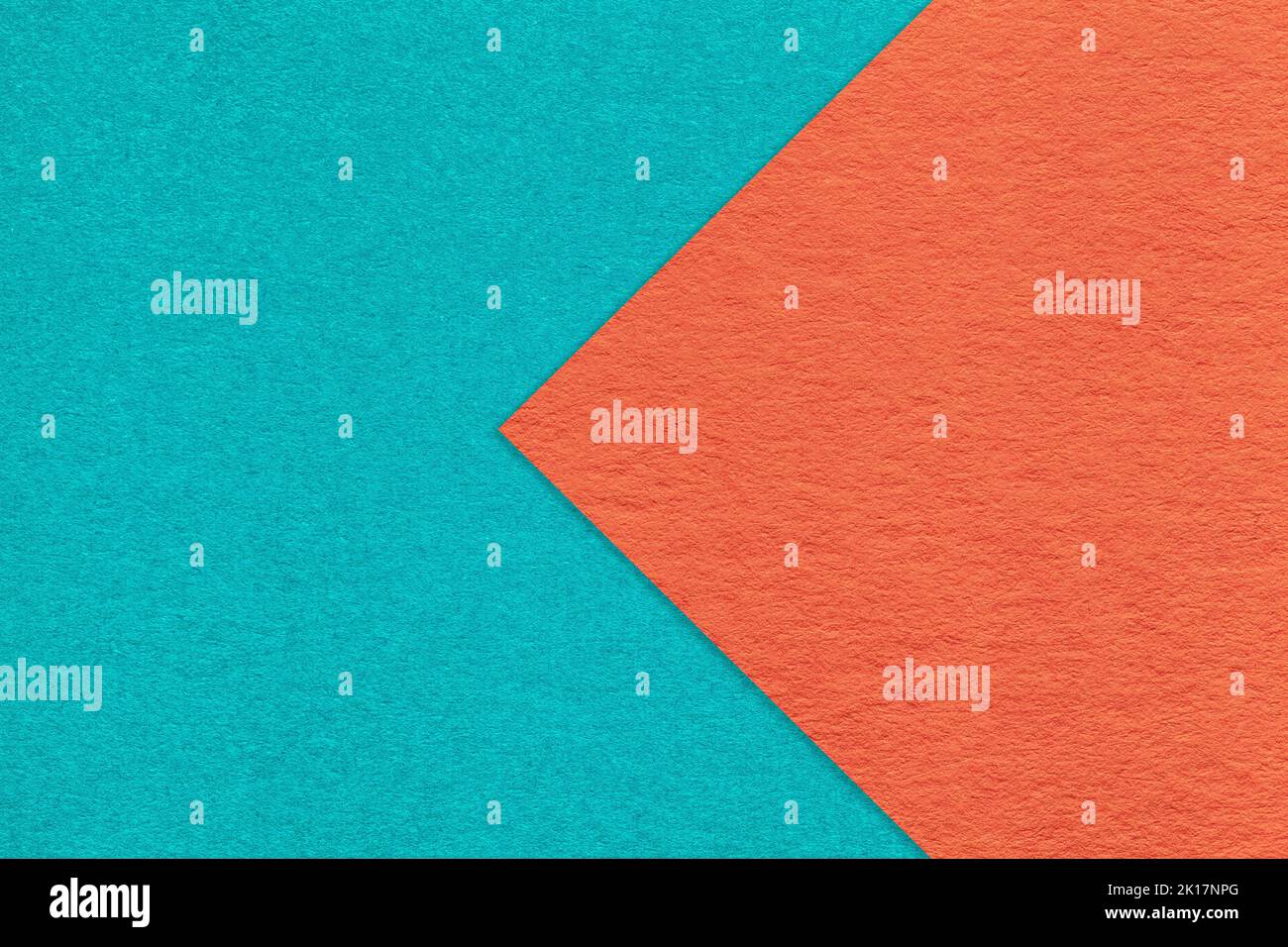 Texture of cyan and orange paper background, half two colors with arrow ...