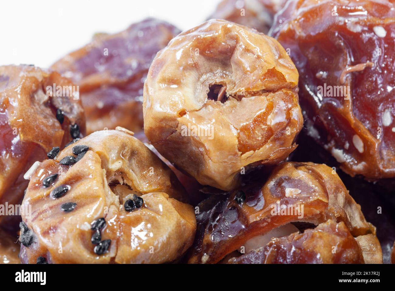 Traditional Arabic Sukari dates close up with nuts and arab herbs full ...
