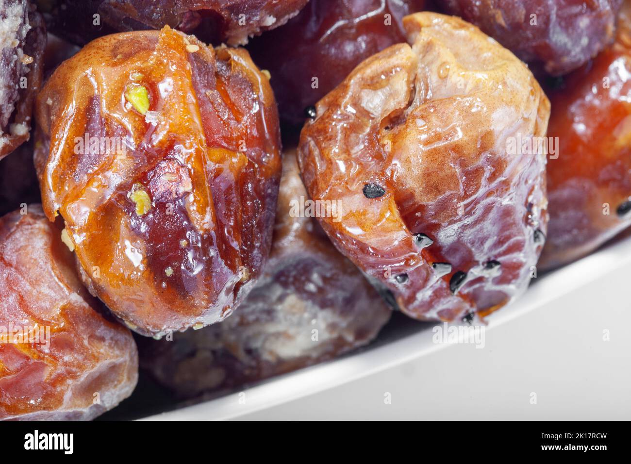 Traditional Arabic Sukari dates close up with nuts and arab herbs full ...