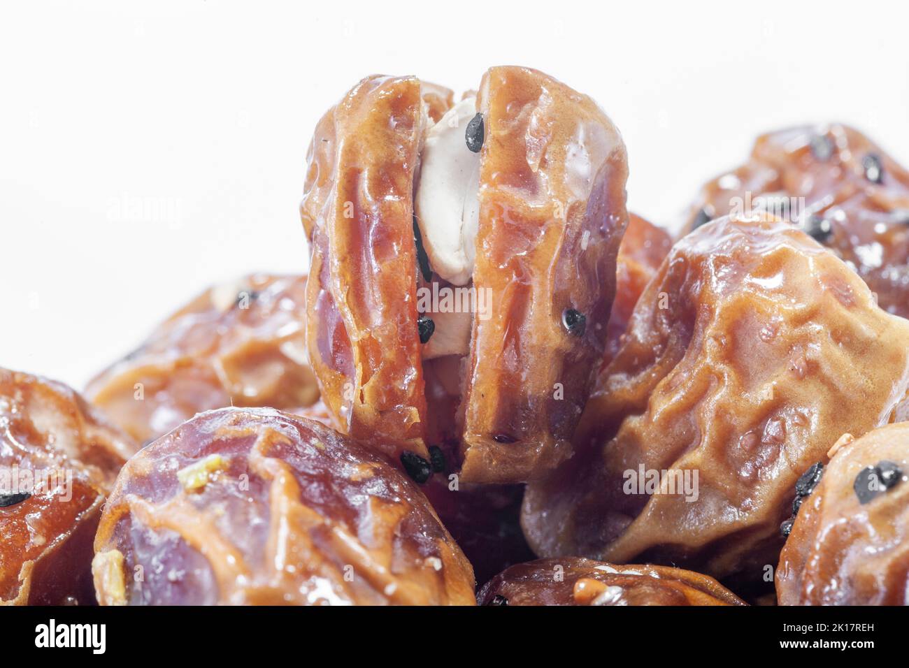 Traditional Arabic Sukari dates close up with nuts and arab herbs full ...