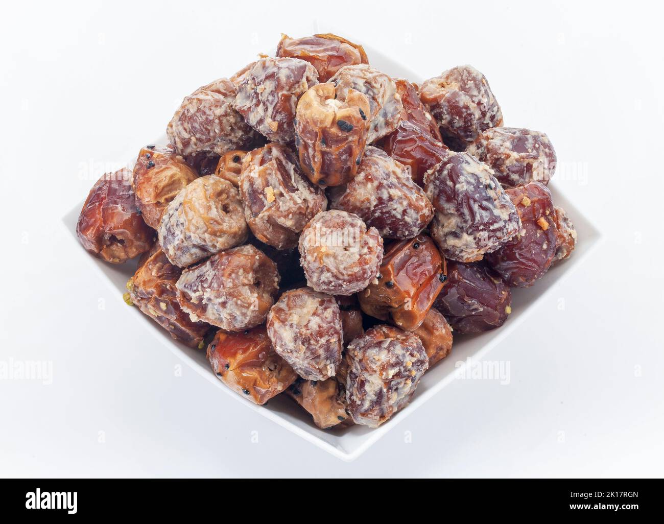 Traditional Arabic Sukari dates close up with nuts and arab herbs full ...