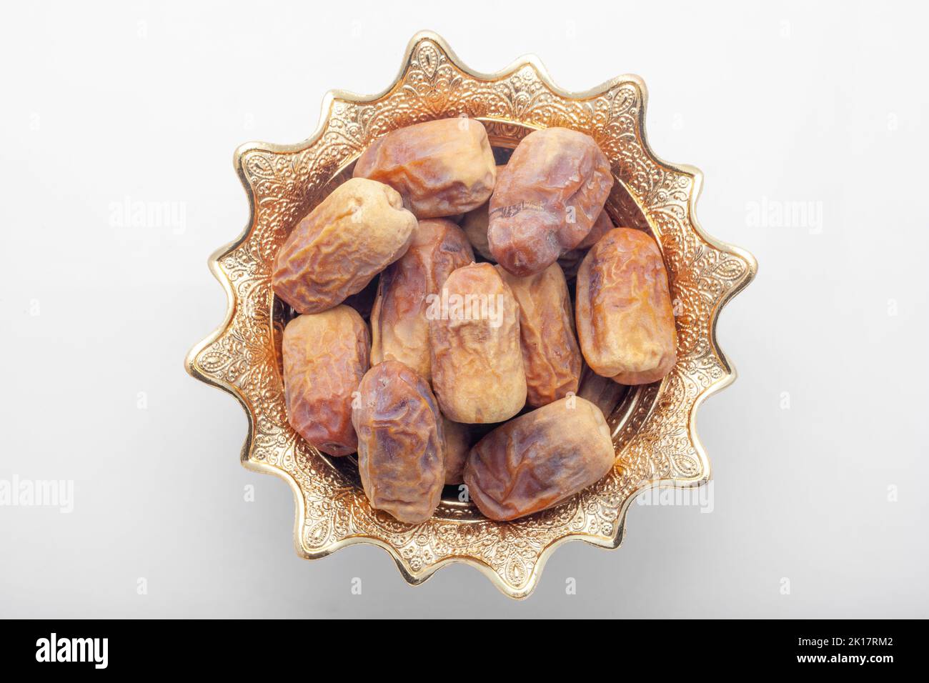 Traditional Arabic Sukari dates close up with nuts and arab herbs full ...