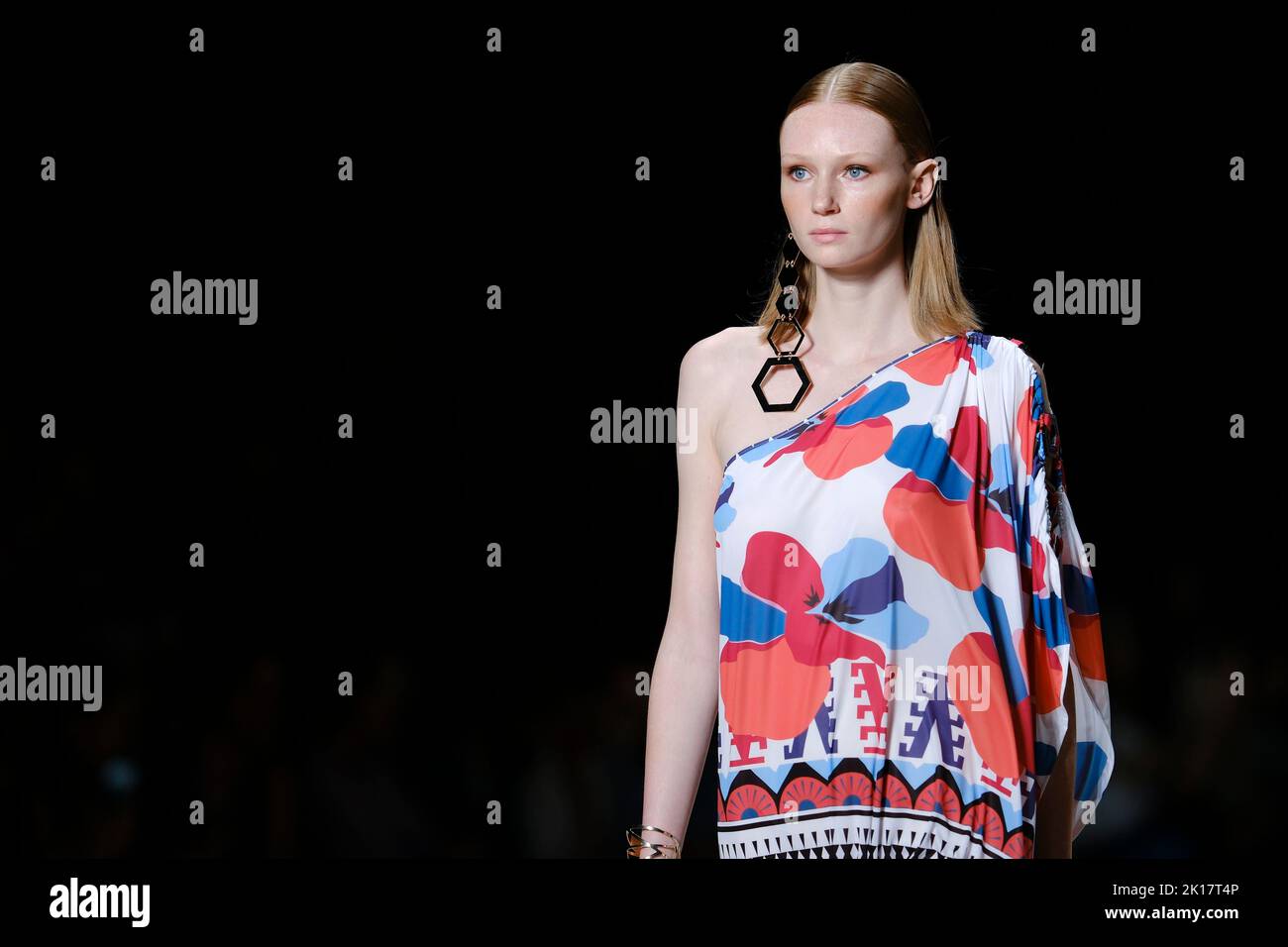 A model walks the runway wearing a creation of Dolores Cortes during ...