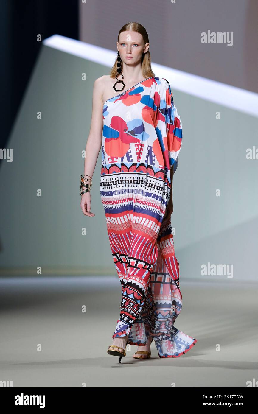 A model walks the runway wearing a creation of Dolores Cortes during ...