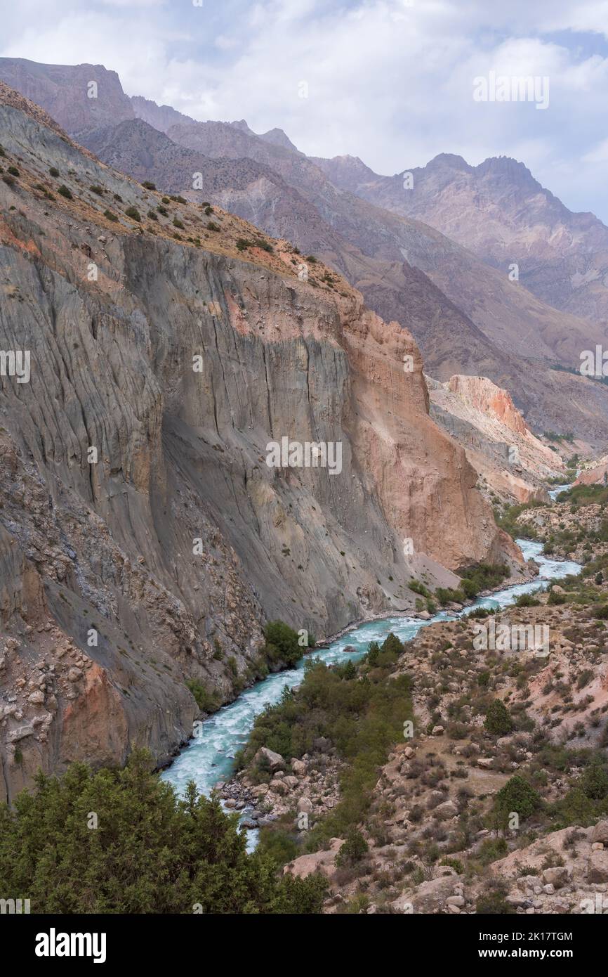 Colorful landscape view of pink and turquoise Iskander darya river ...