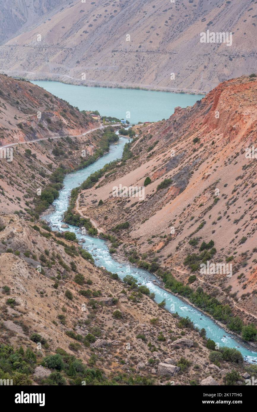 Scenic and colorful landscape view of turquoise lake Iskanderkul and ...