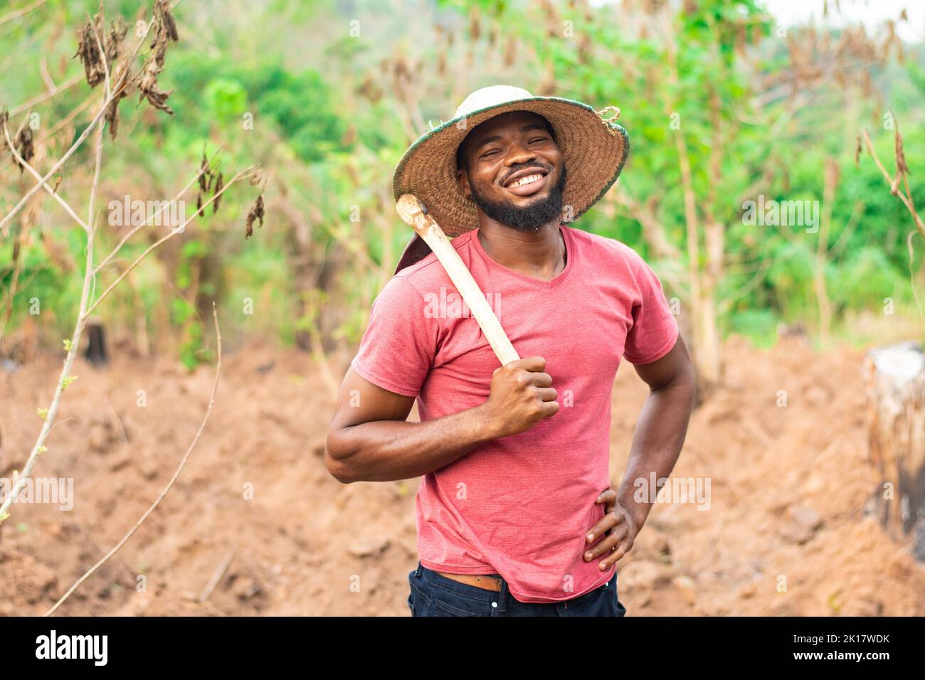 portrait of an african farmer smiling Stock Photo - Alamy