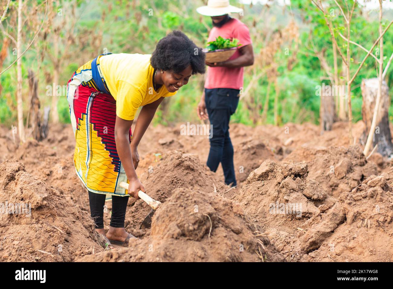 african farmers at work on a farm Stock Photo - Alamy