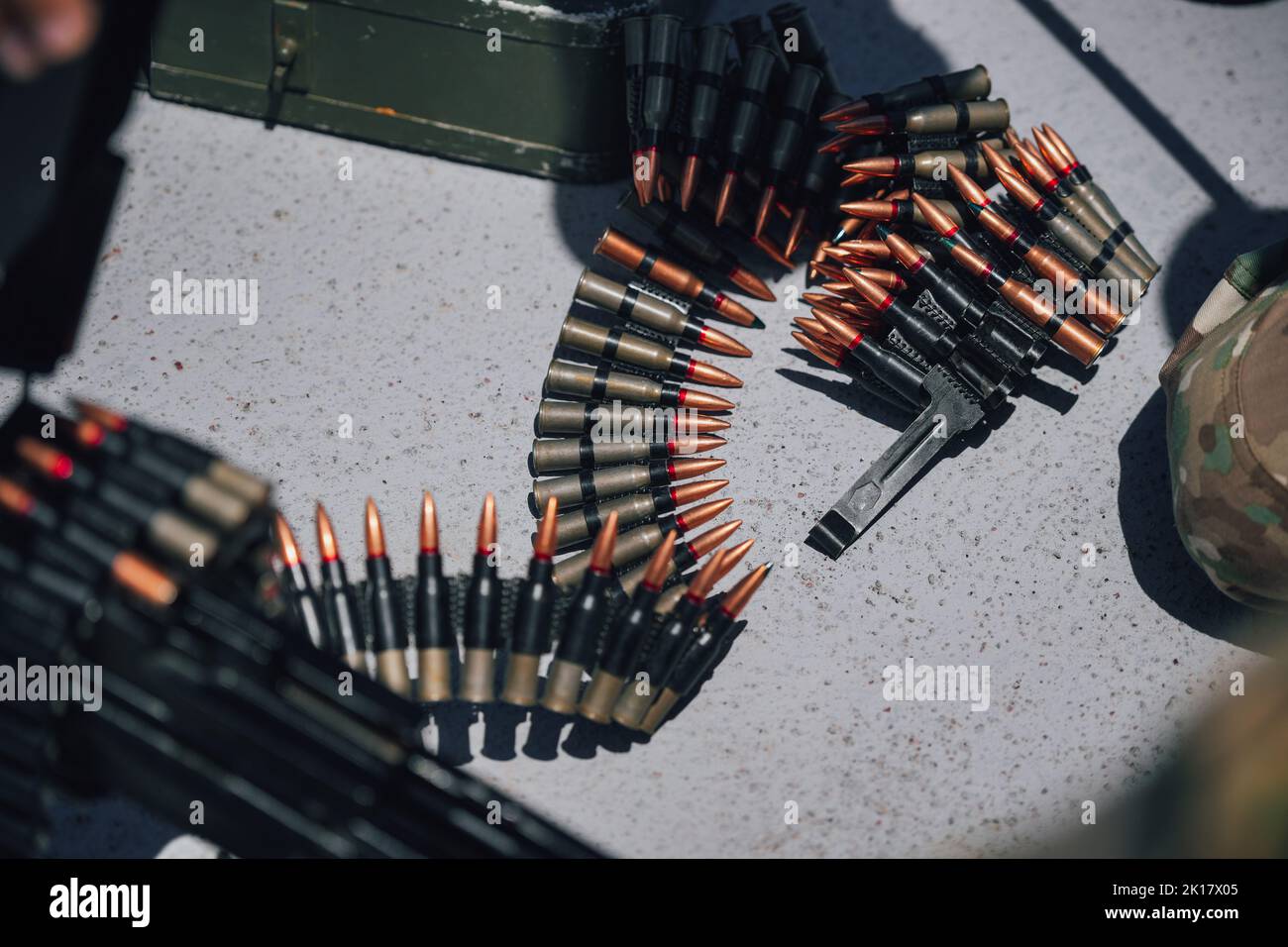 Close up shot of a machine gun belt loaded with cartridges Stock Photo ...