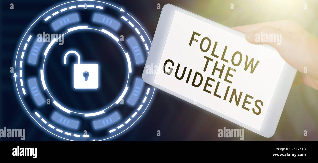 Hand writing sign Follow The Guidelines. Business approach Manual of ...