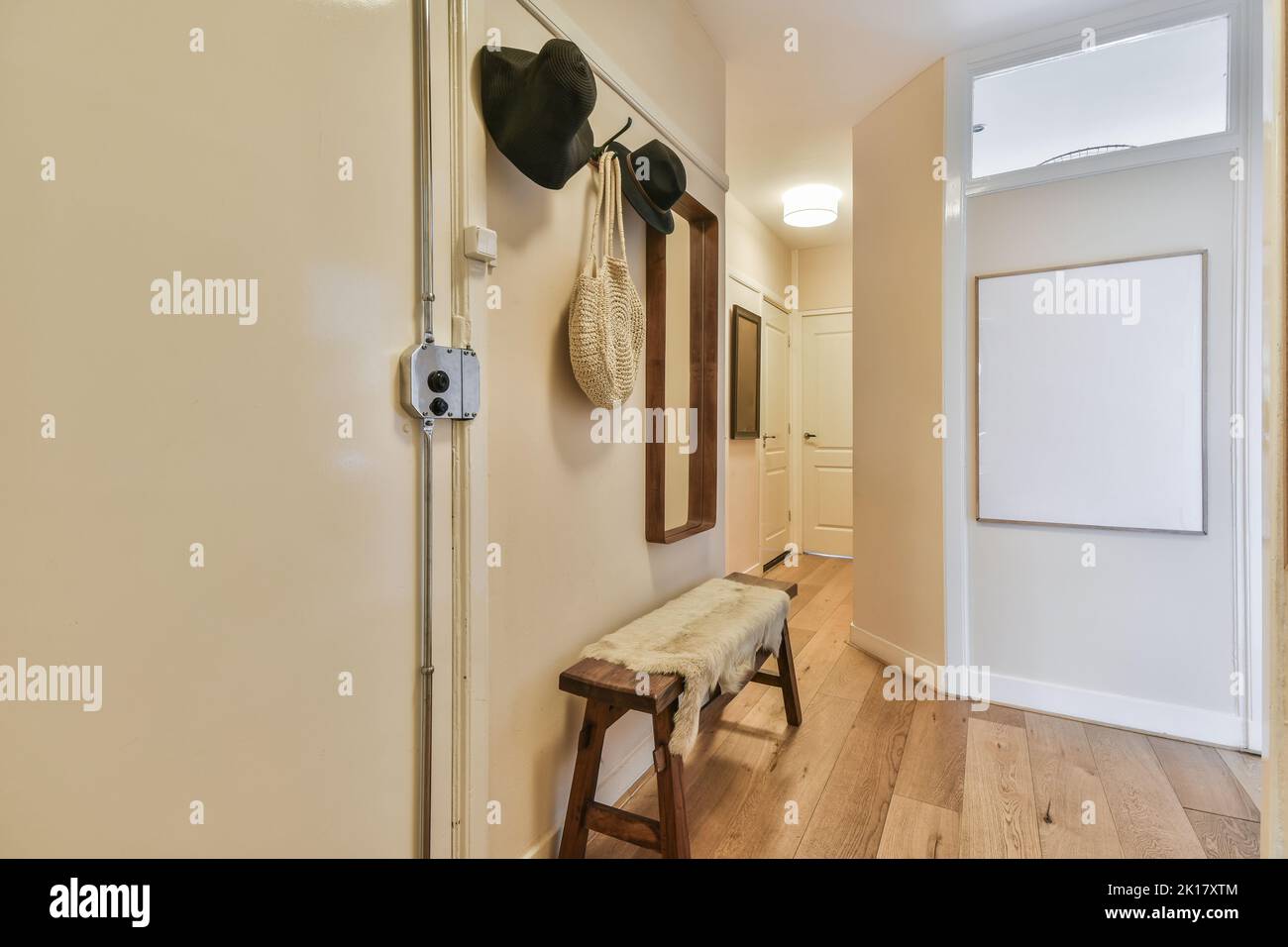 Interior of narrow corridor with many doors Stock Photo - Alamy