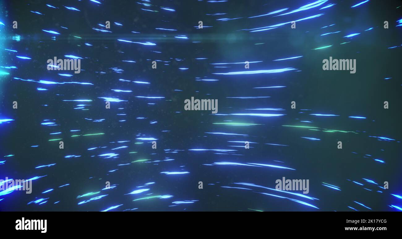 Image of multiple blue glowing light trails spinning in hypnotic motion ...