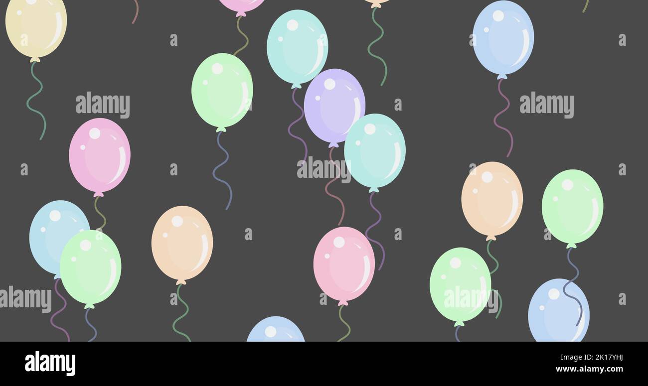 Image of multiple multi coloured balloons flying against grey ...