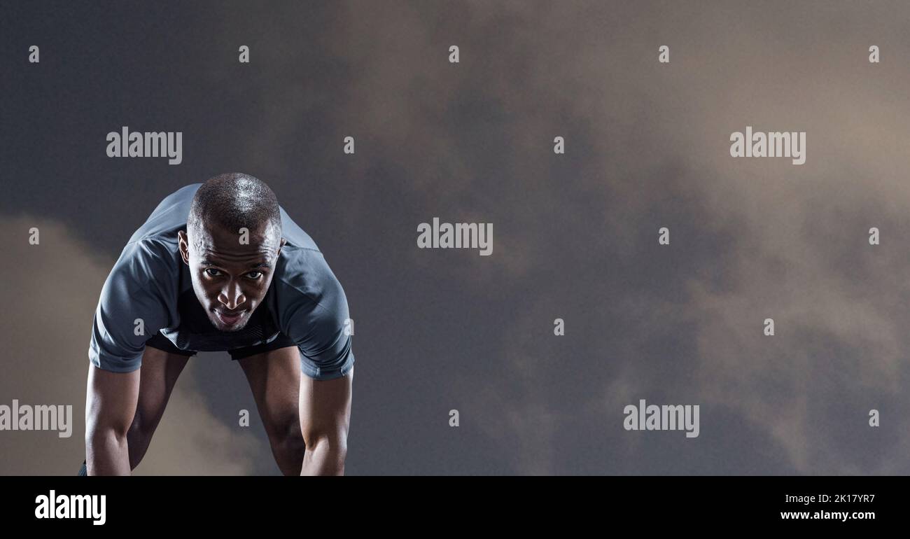 Composition of male rugby player over blue sky with clouds. sport and ...