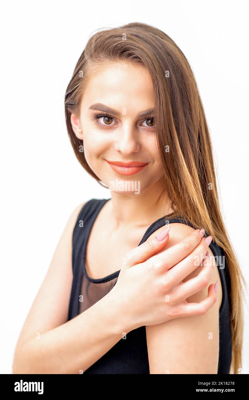 Portrait of a beautiful young caucasian smiling brunette woman with ...