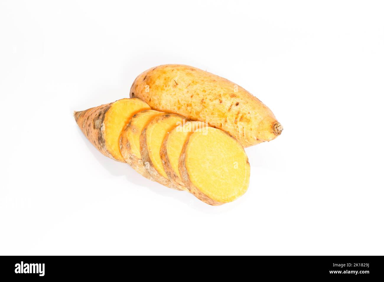 Uncooked potato section isolated on white background closeup Stock ...