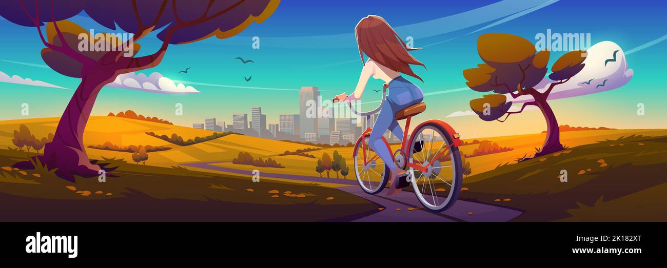Girl rides on bike on road to city. Autumn landscape with fields, trees ...