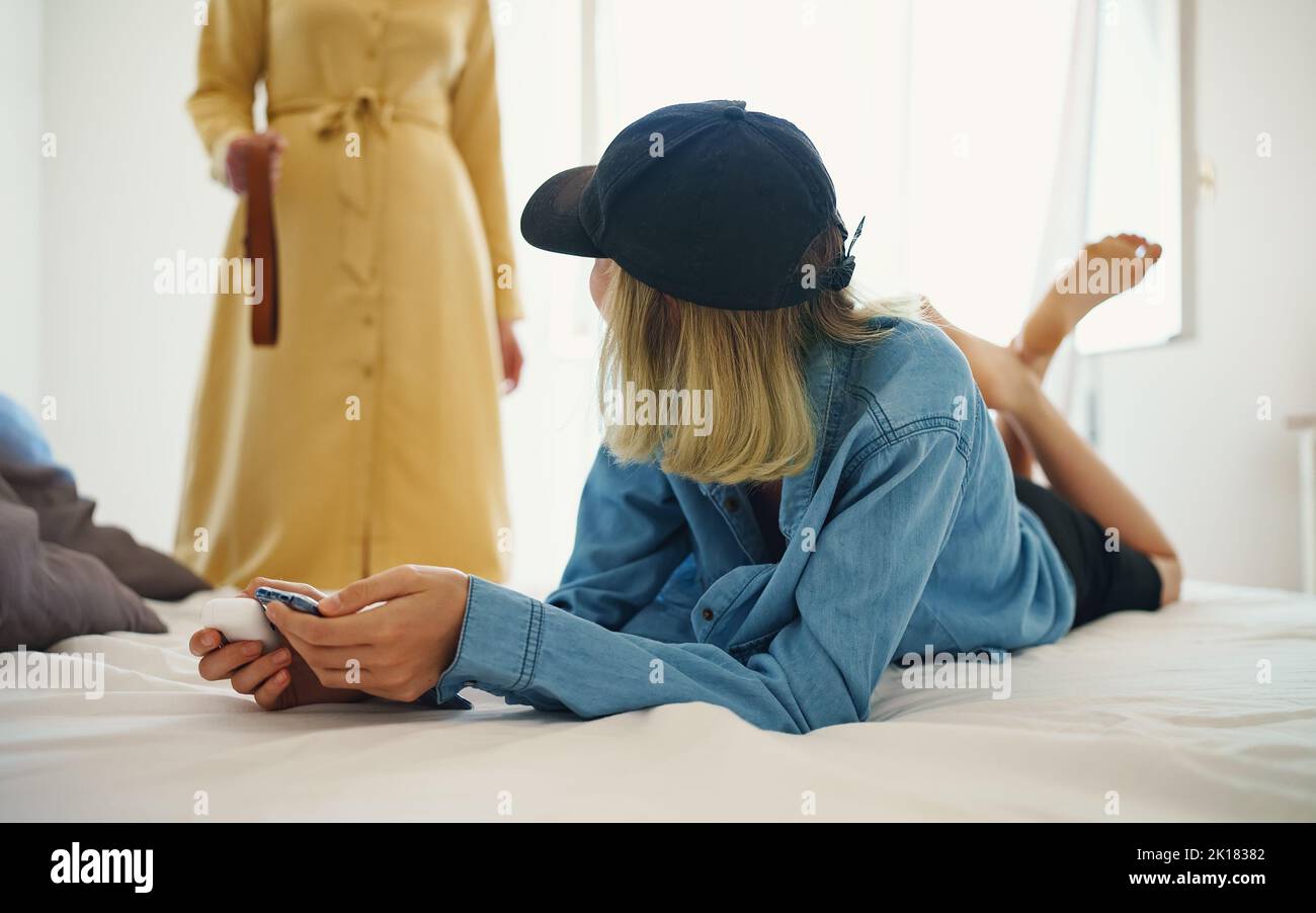Mother lecture with teenage daughter over use of smartphone Stock Photo ...