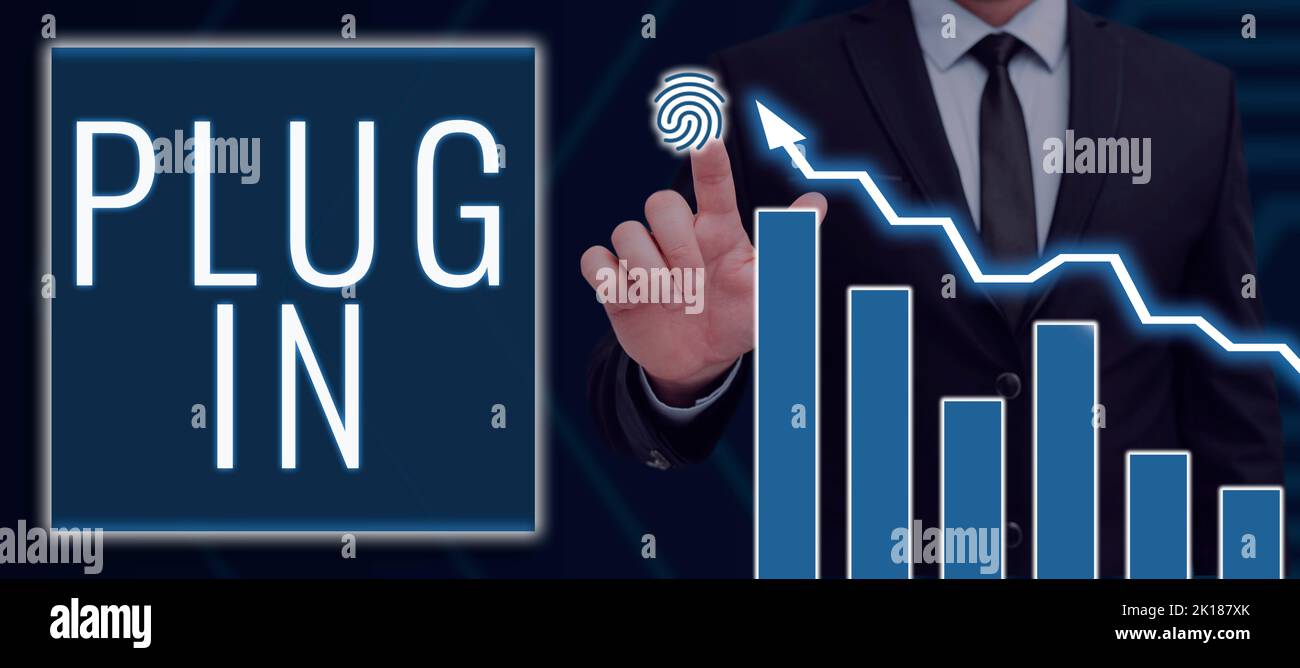 Hand writing sign Plug In. Business overview putting device into ...
