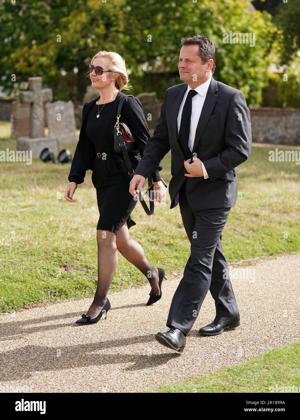 Chris Hollins and wife Sarah Alexander arrive for the funeral of TV ...