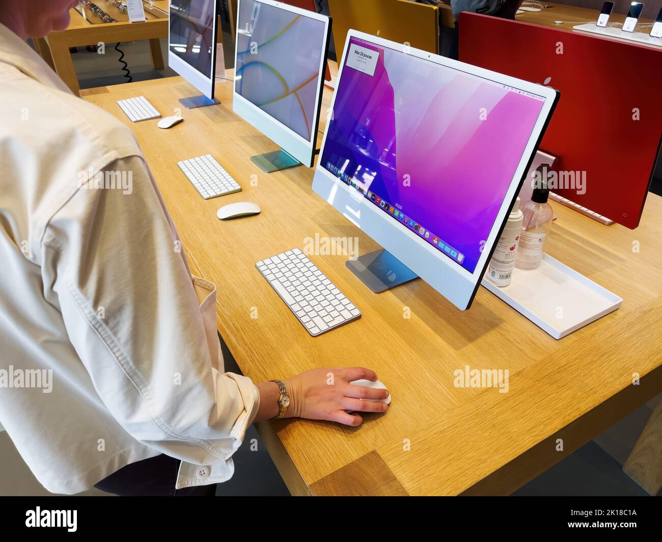 Paris, France - Sept 9, 2022: Side view of woman looking at the latest ...