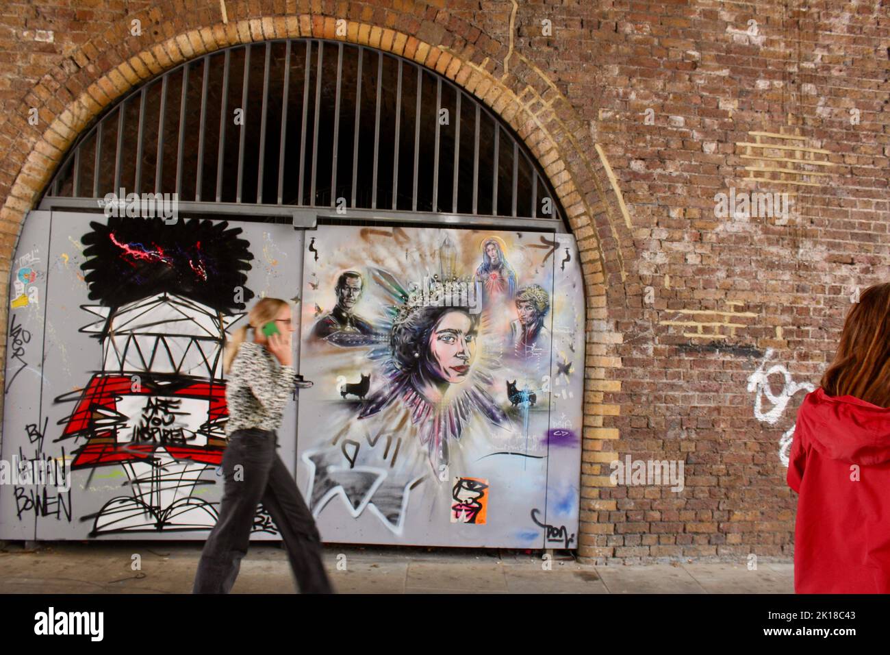 graffiti tributes to queen elizabeth 2; scenes from central london in ...